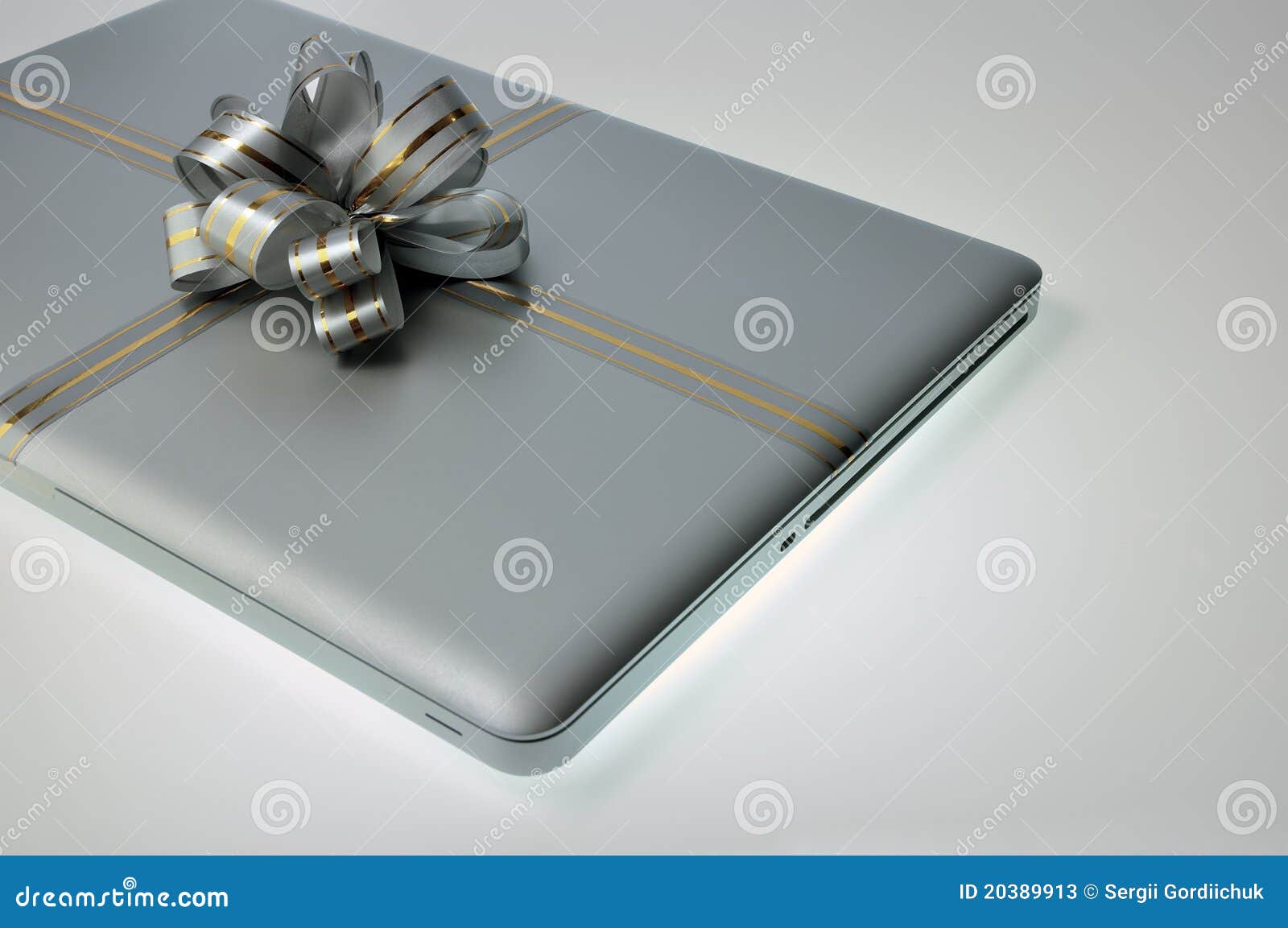 Laptop like a present stock image. Image of silver, holiday - 20389913