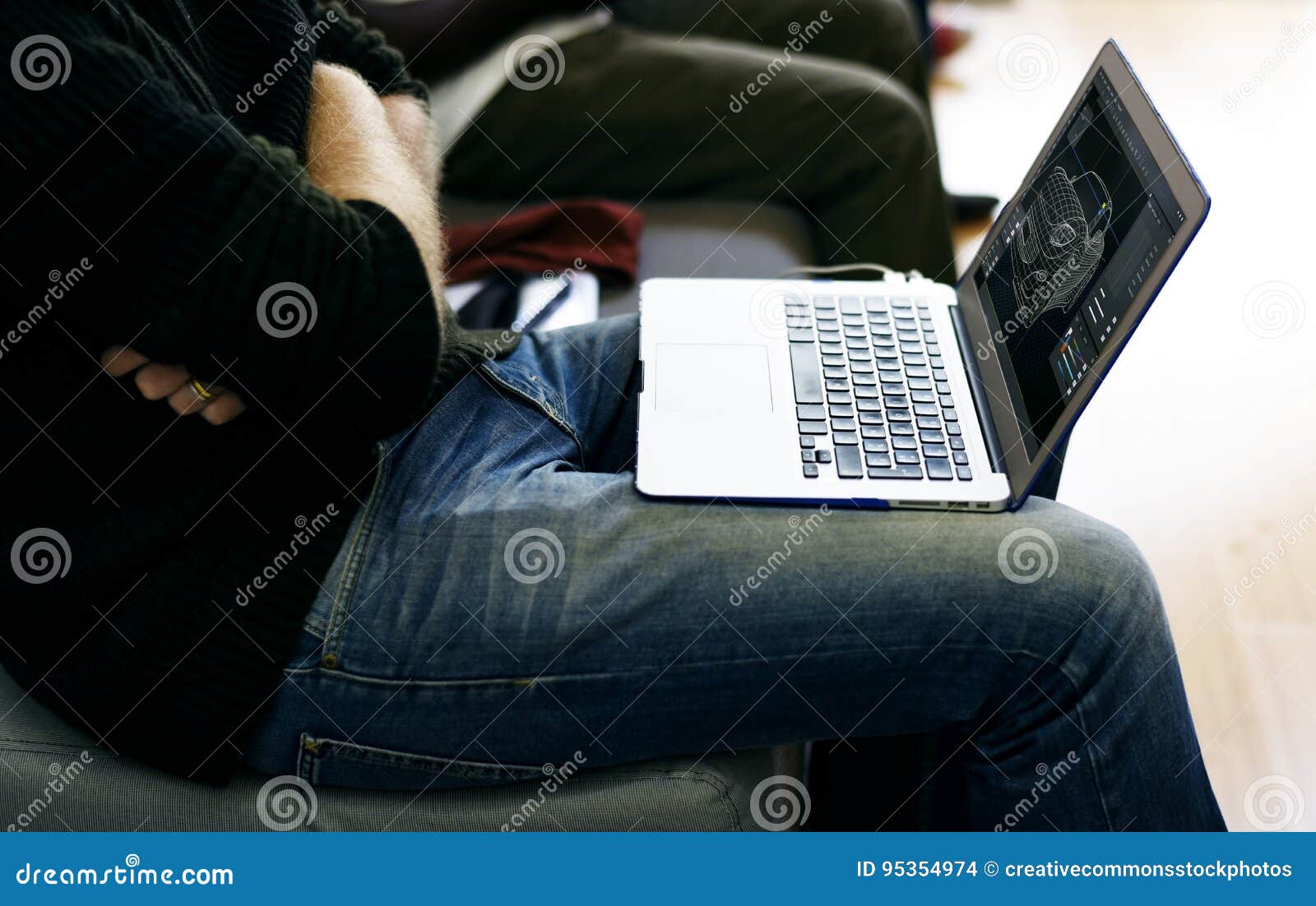 Laptop In Man's Lap Picture. Image: 95354974