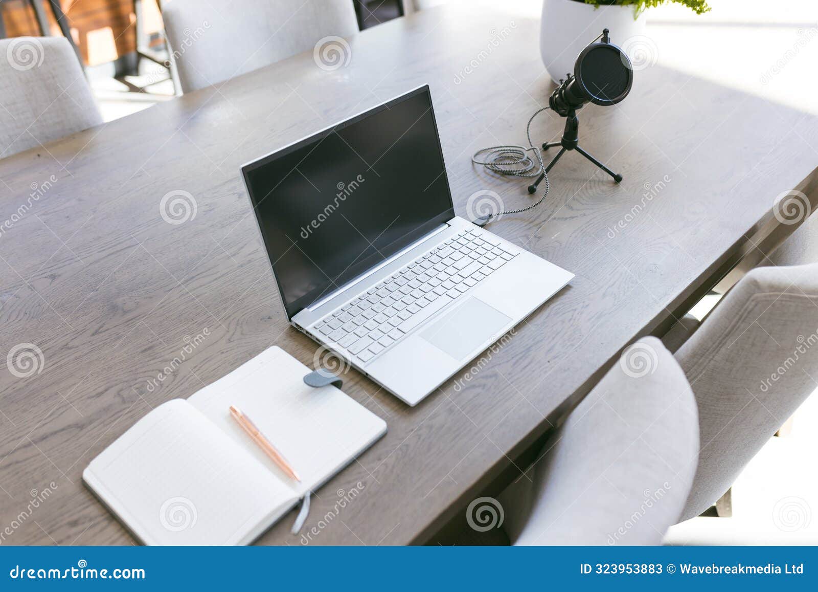 Laptop, Microphone, and Notebook on Table, Ready for Home Recording ...