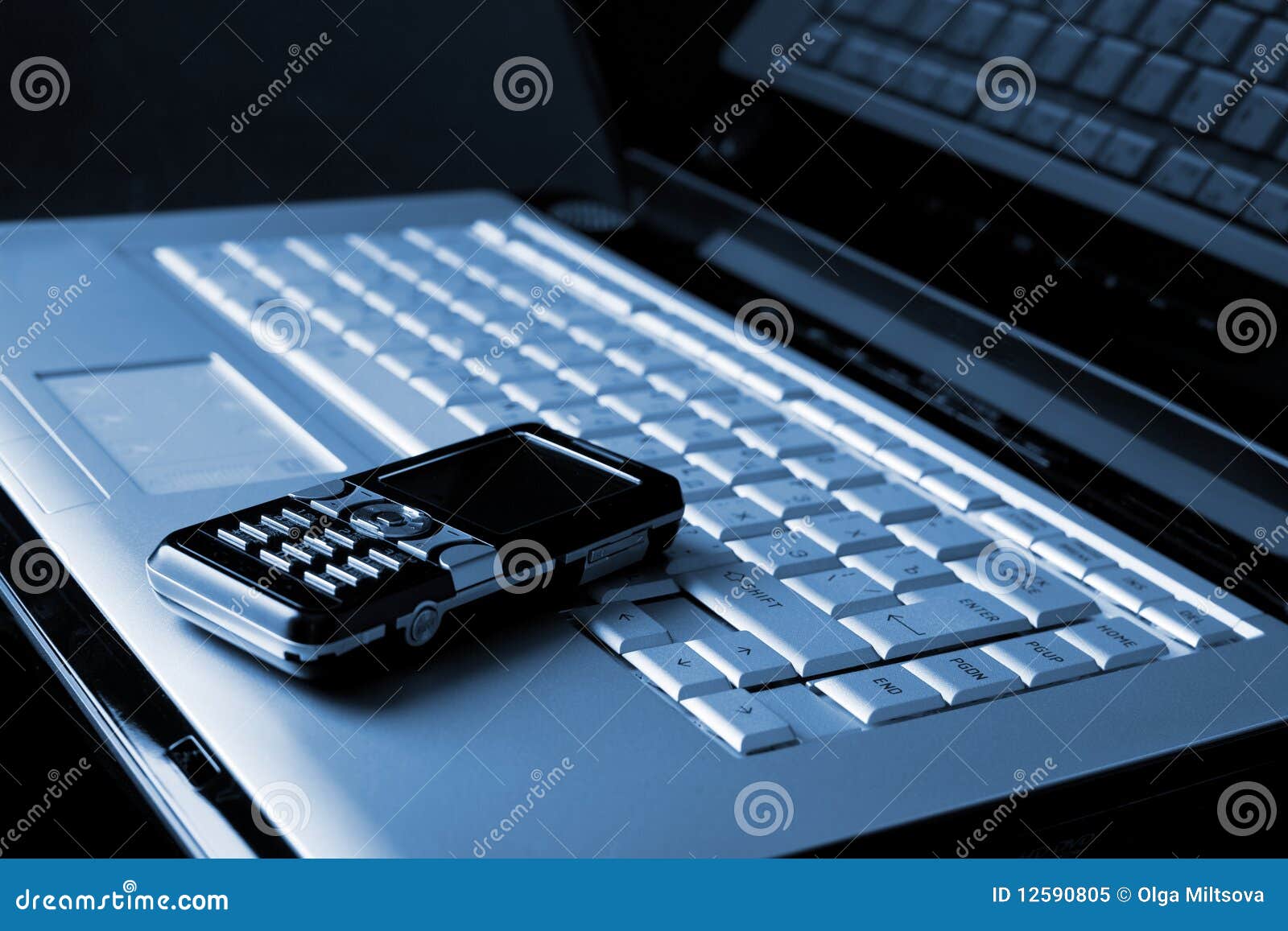 Laptop and mobile phone stock image. Image of computing - 12590805