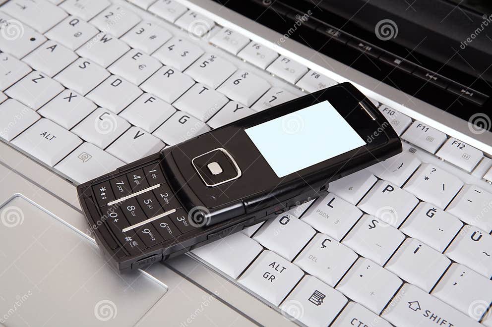 Laptop and mobile phone stock image. Image of button, technology - 4477277