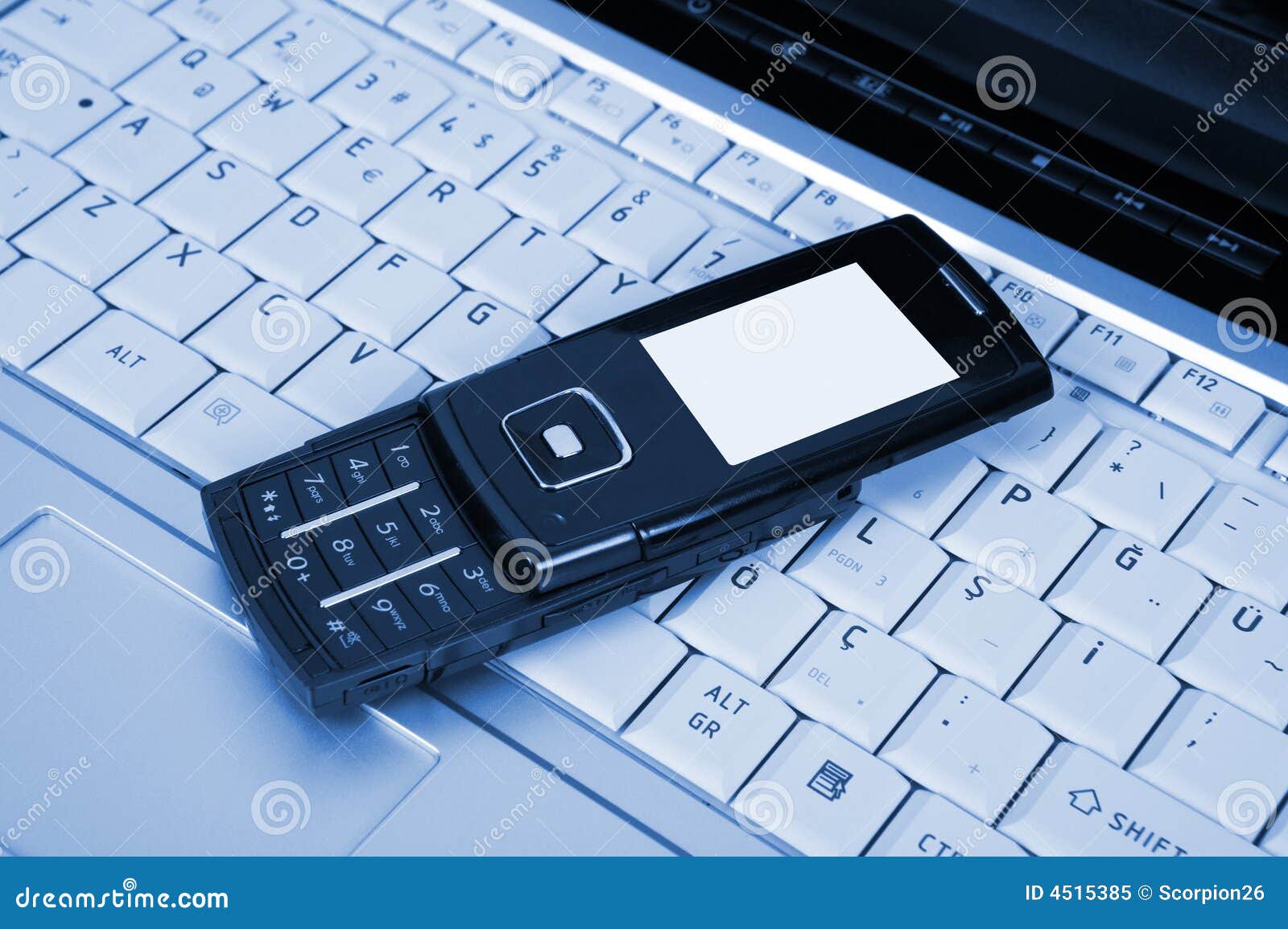 Laptop and mobile phone stock image. Image of button, single - 4515385