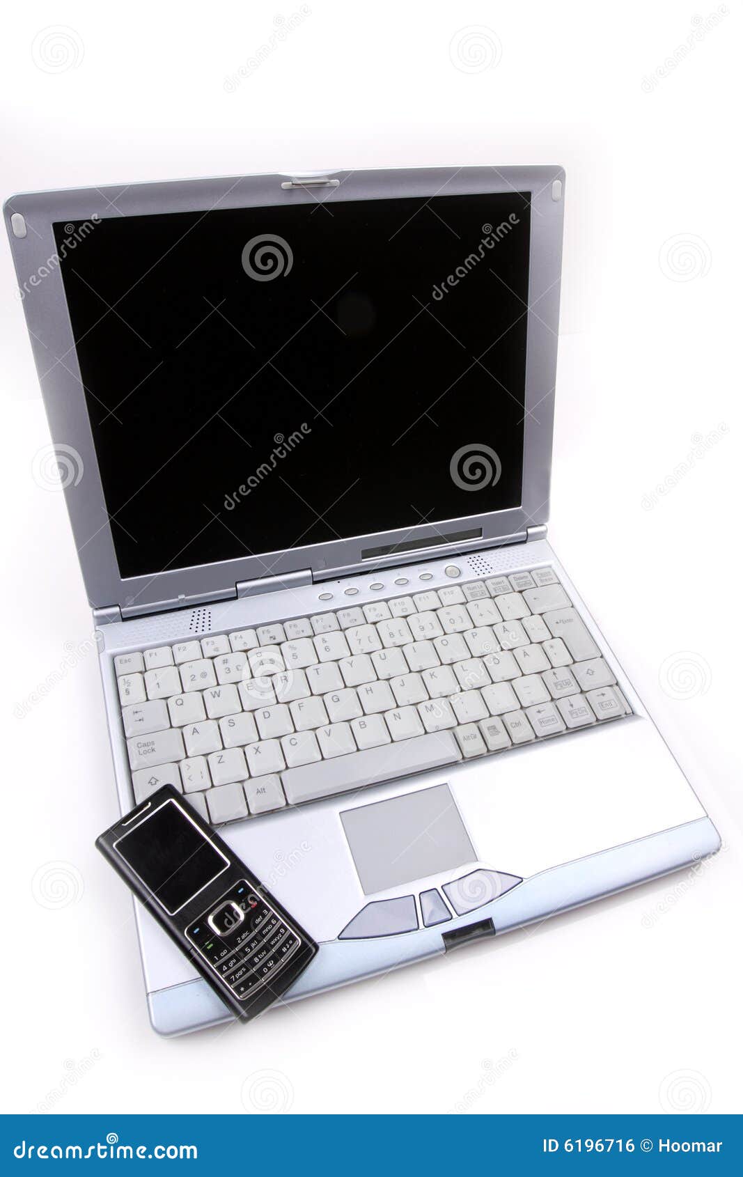 Laptop and a mobile phone stock photo. Image of display - 6196716