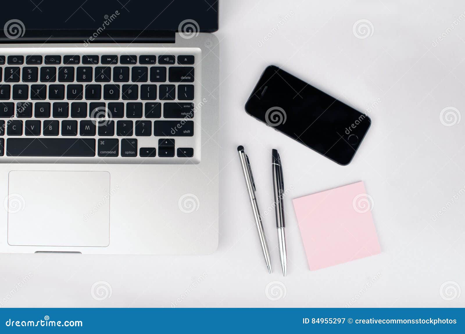 Laptop With Mobile Phone And Sticky Notes Picture. Image: 84955297