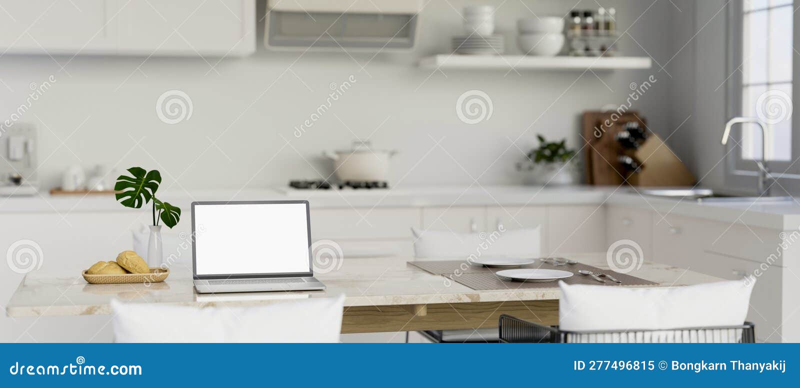 A Laptop Mockup on a Dining Table in Modern White Kitchen Stock ...