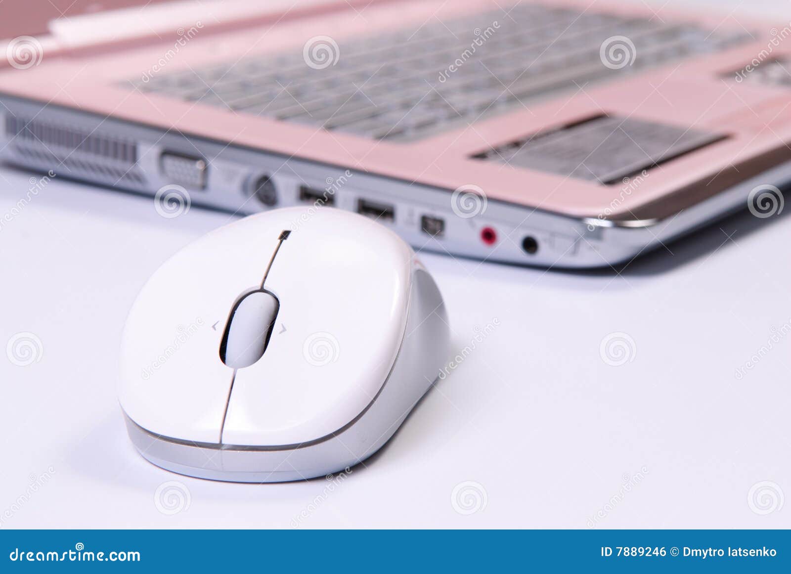 Laptop with mouse close-up stock photo. Image of wireless - 7889246