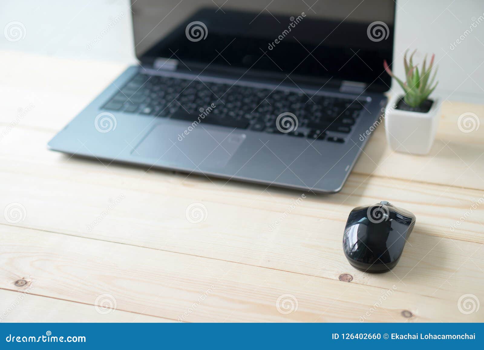 Laptop and mouse on table stock photo. Image of conference - 126402660