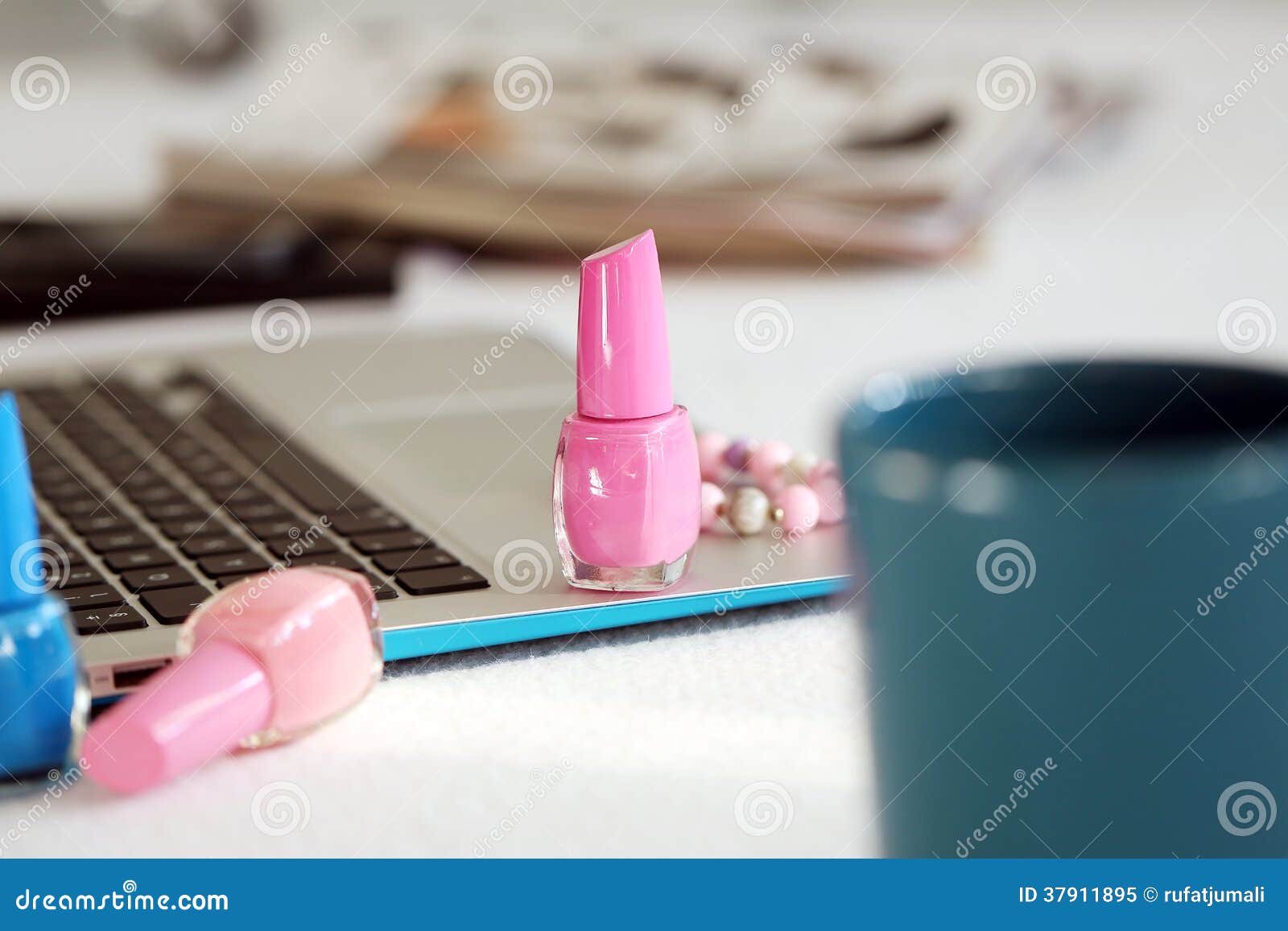 Laptop, Mug and Nail Polish Stock Image - Image of home, blue: 37911895