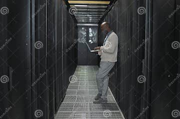 Laptop, Network and Data Center with it Black Man for Research ...