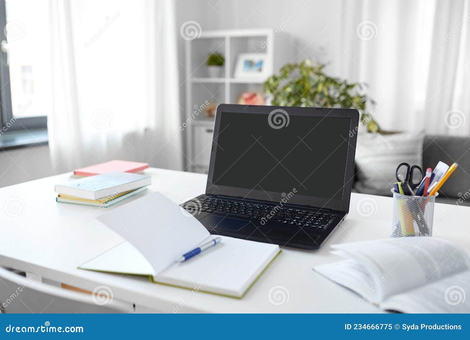 Laptop, Notebook and Book on Table at Home Office Stock Image - Image ...