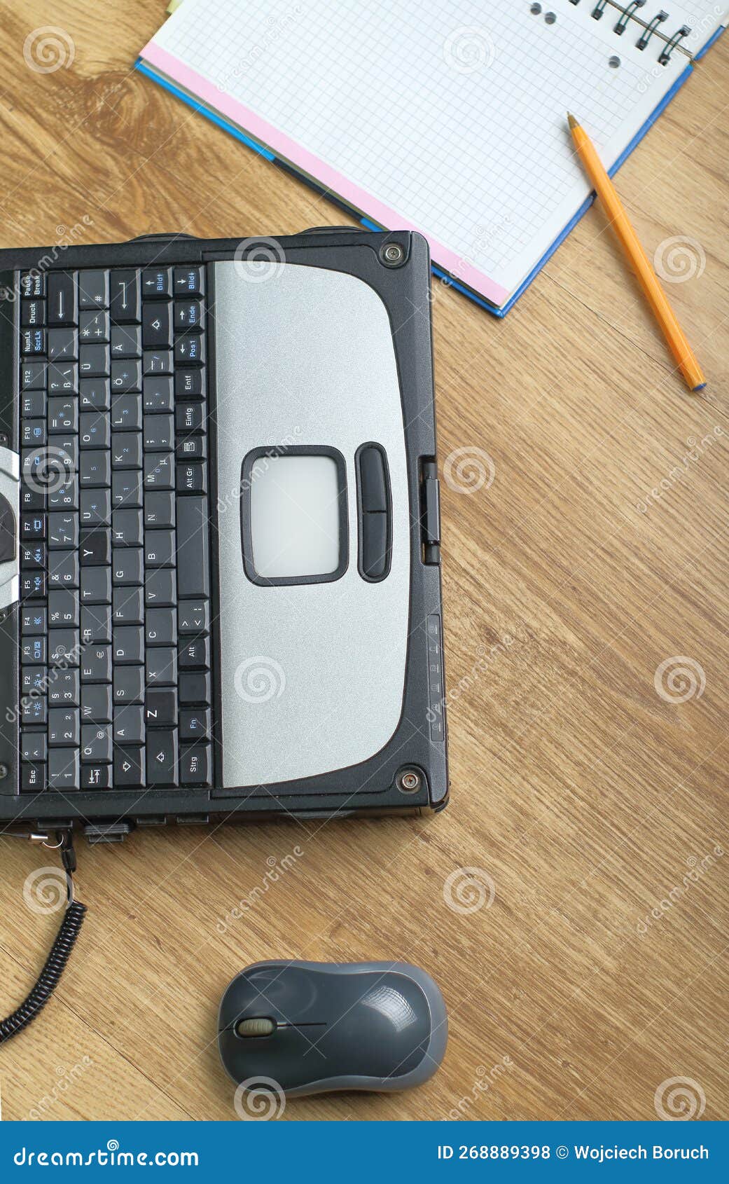 A Laptop with a Notebook and a Pen on the Panels Stock Photo - Image of ...