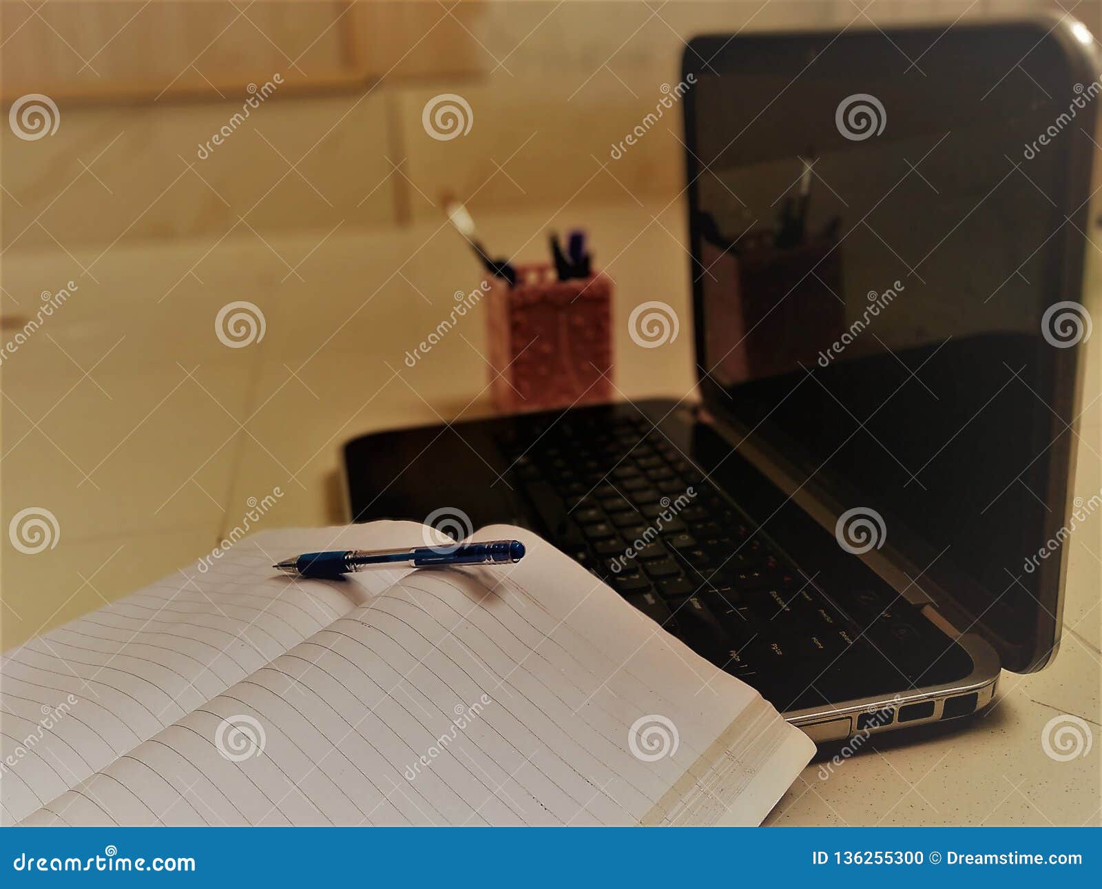 Laptop and notepad stock photo. Image of desktop, notepad - 136255300