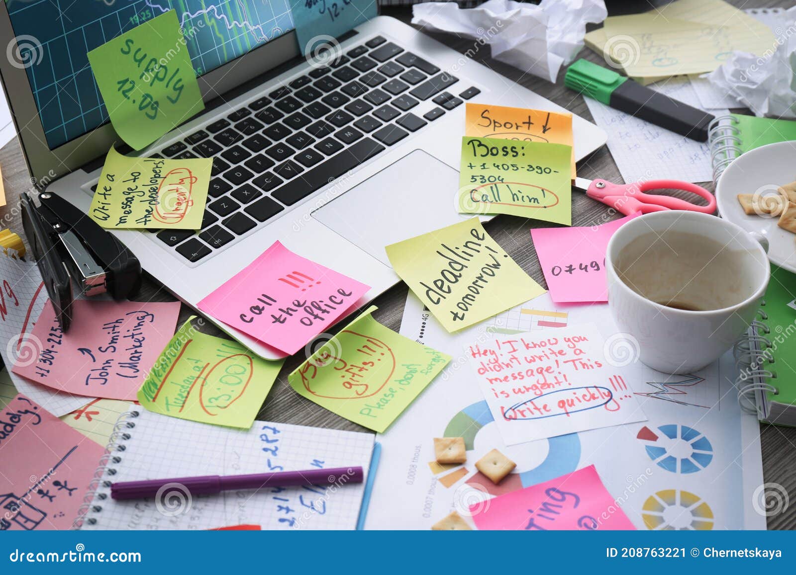 Laptop, Notes and Office Stationery in Mess on Desk. Overwhelmed with ...