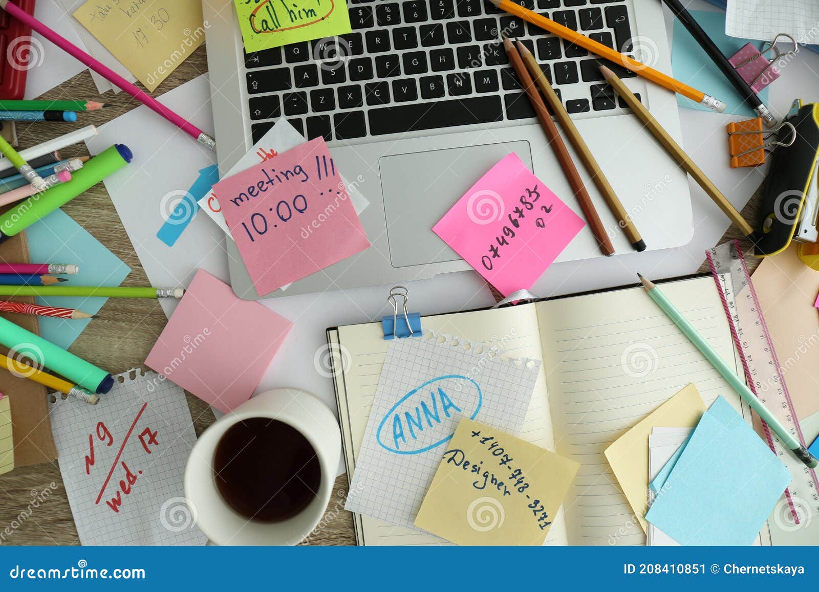 Laptop, Notes and Office Stationery in Mess on Desk, Top View ...