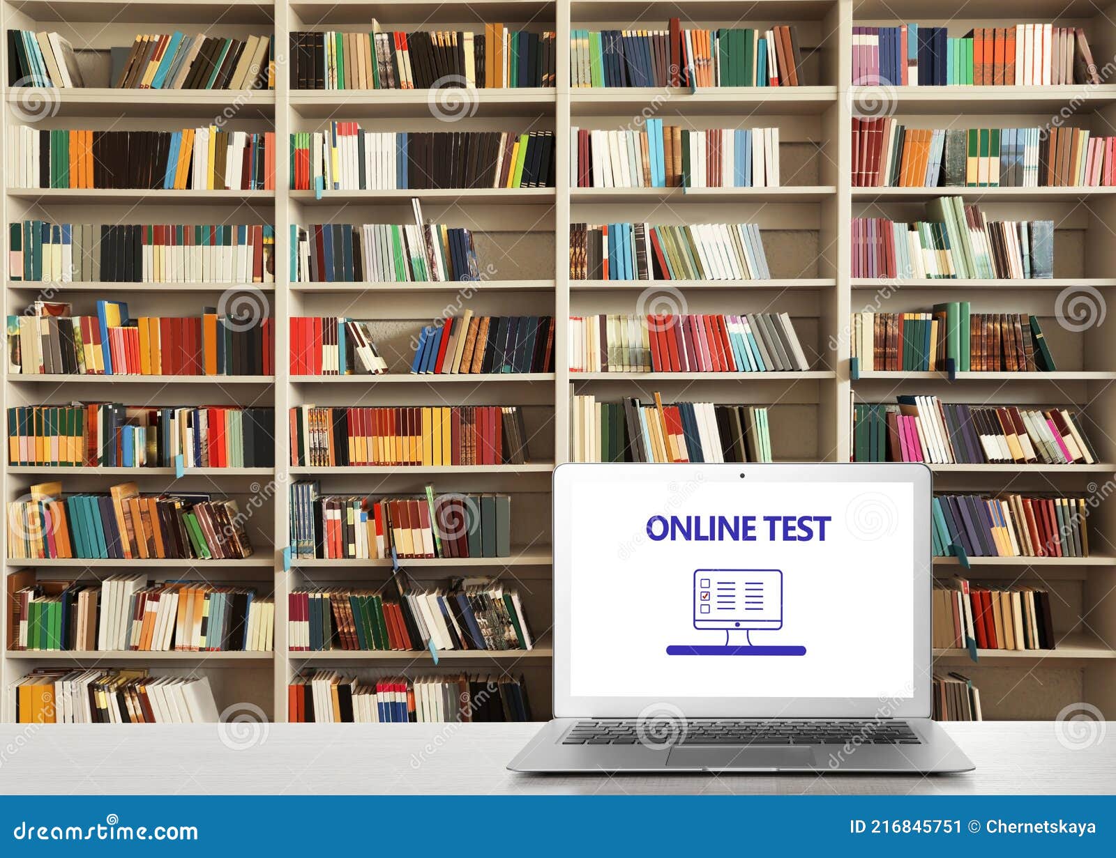 Laptop with Online Test on Screen in Library Stock Image - Image of ...