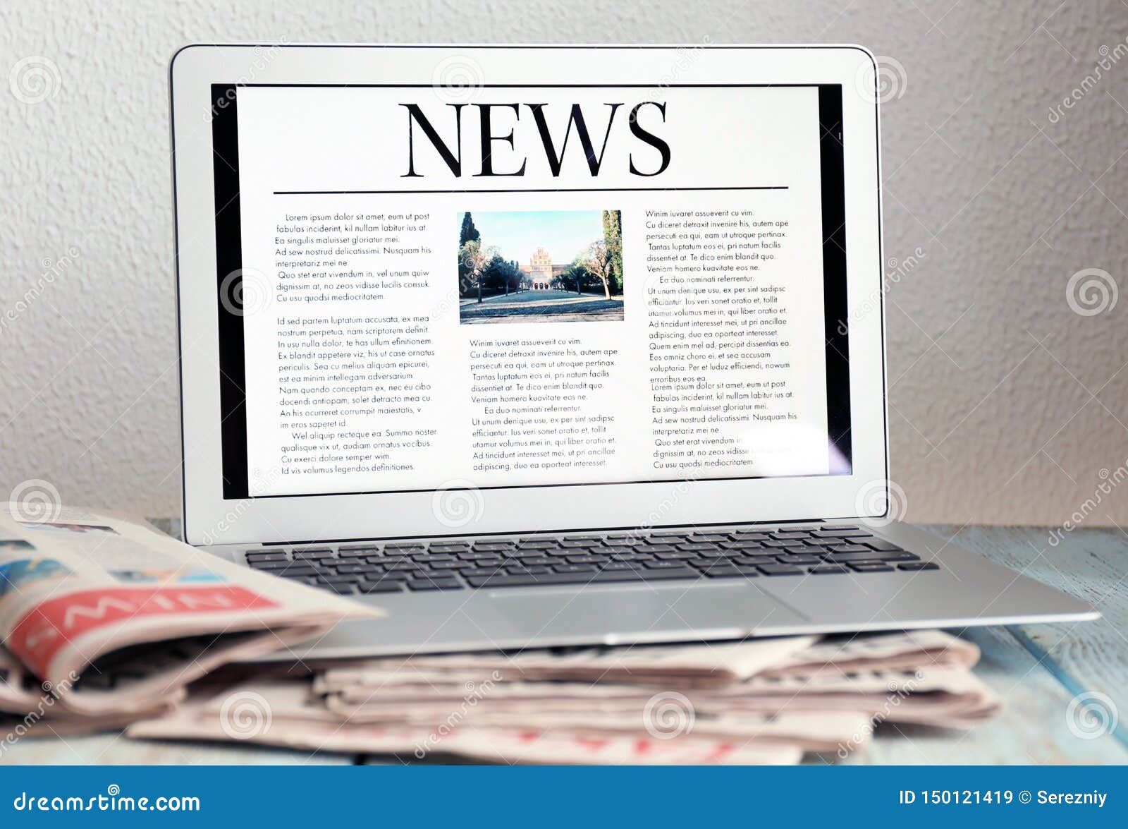 Laptop with Open News Page and Newspapers on Table Stock Image - Image ...