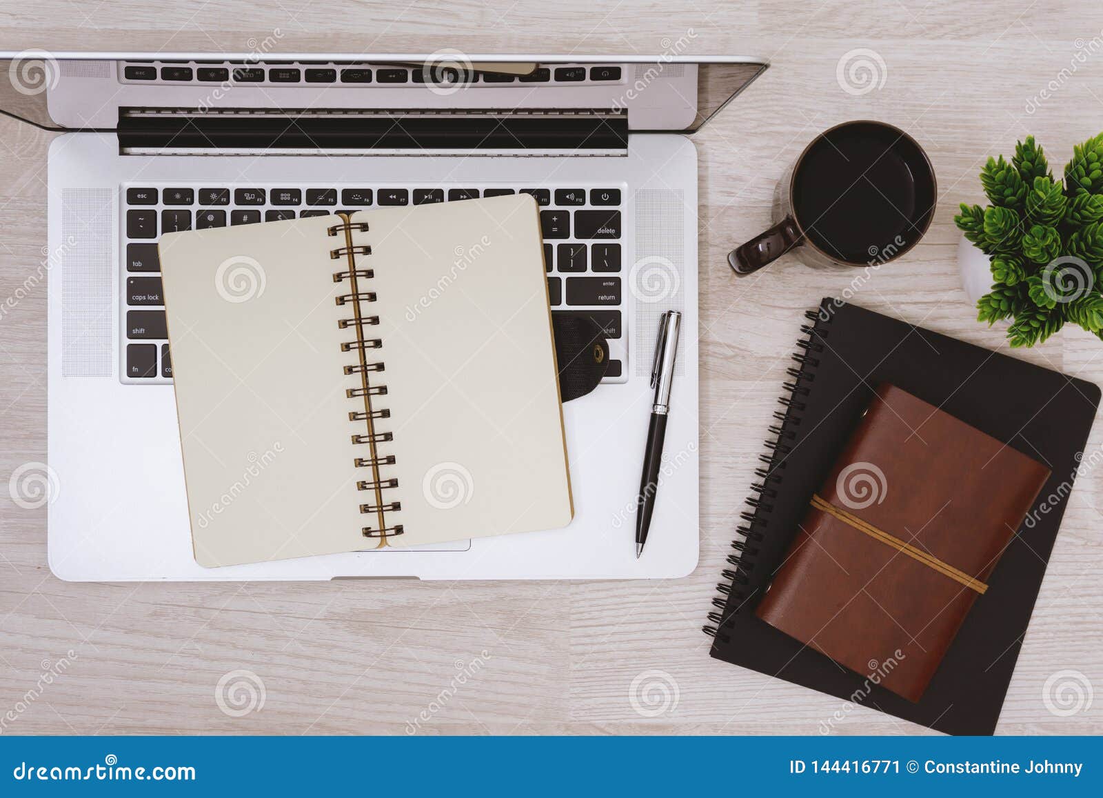 Laptop, Open Notebook and Coffee Mug on Table Stock Image - Image of ...
