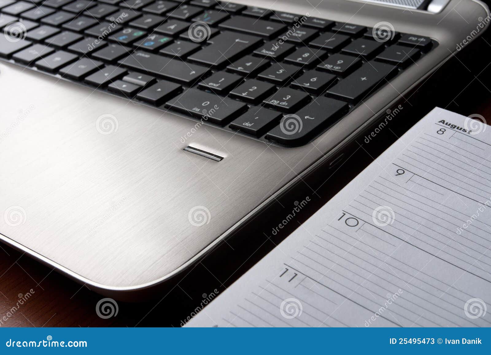 Laptop with opened planner stock image. Image of silver - 25495473