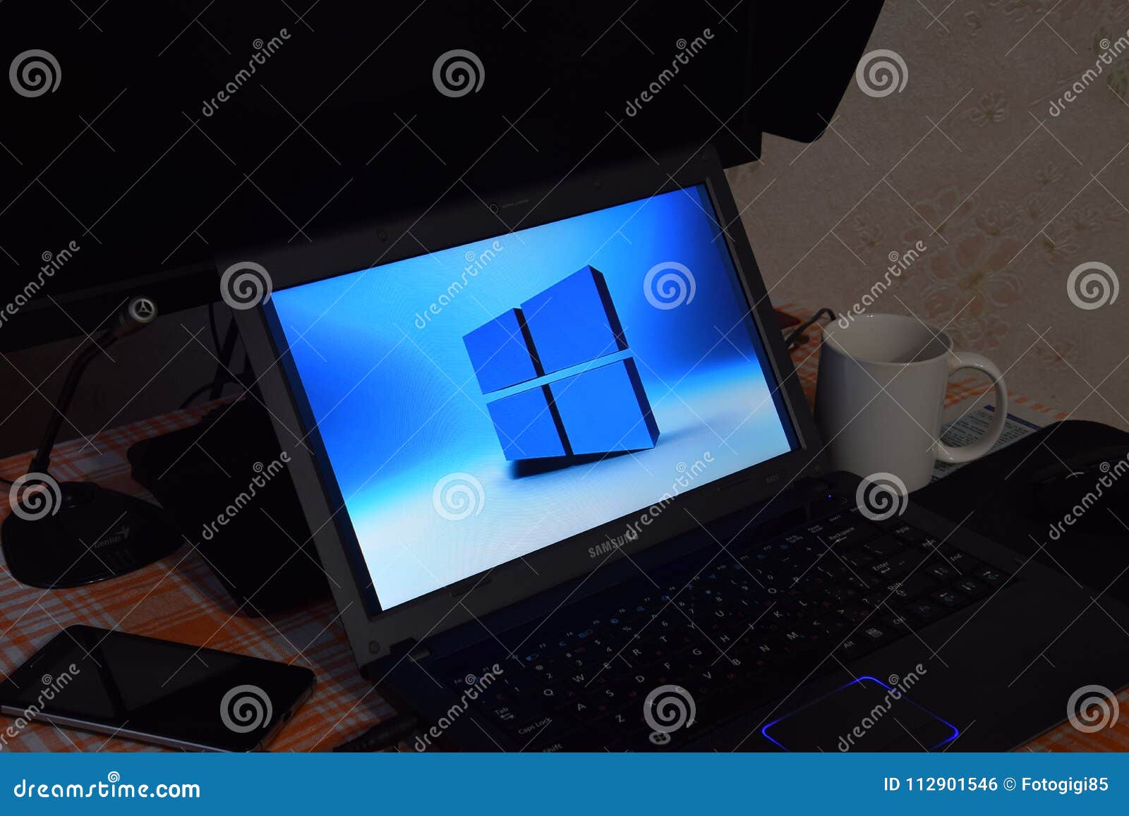 Laptop with the Operating System Logo Displayed on the Screen Windows ... Laptop with the Operating System Logo Displayed on the Screen Windows ...