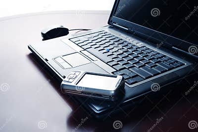 Laptop and Pocket PC stock image. Image of left, notebook - 3045665