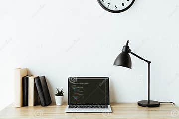 Laptop with Program Code and Books on Work Desk Stock Photo - Image of ...