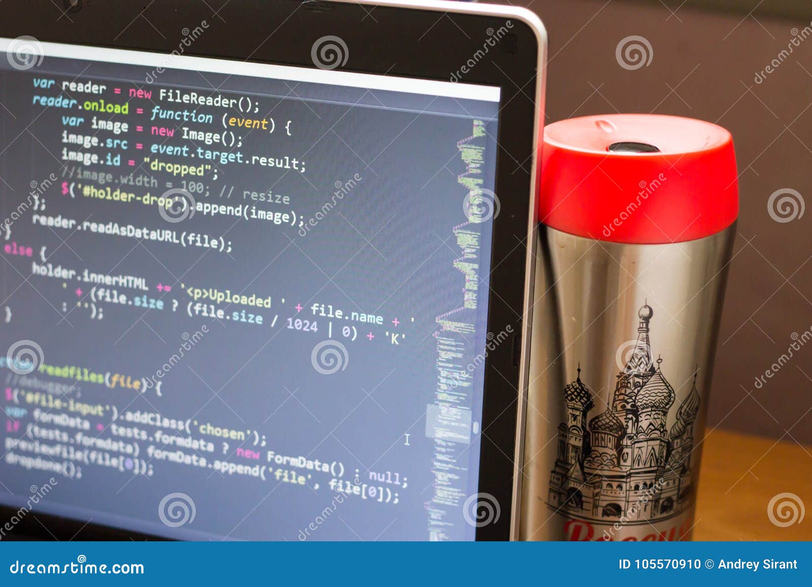 Laptop with Programming Web Code and Red Capped Flask Aside Stock Photo ... Laptop with Programming Web Code and Red Capped Flask Aside Stock Photo ...