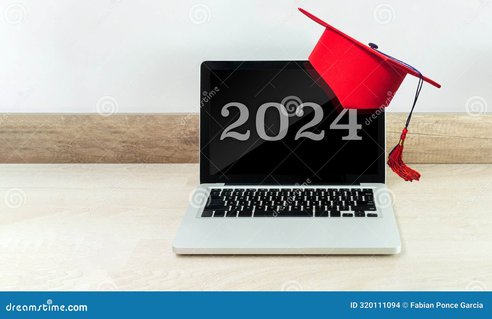 Laptop with Red Graduation Cap with Number 2024 on the Screen Stock ...