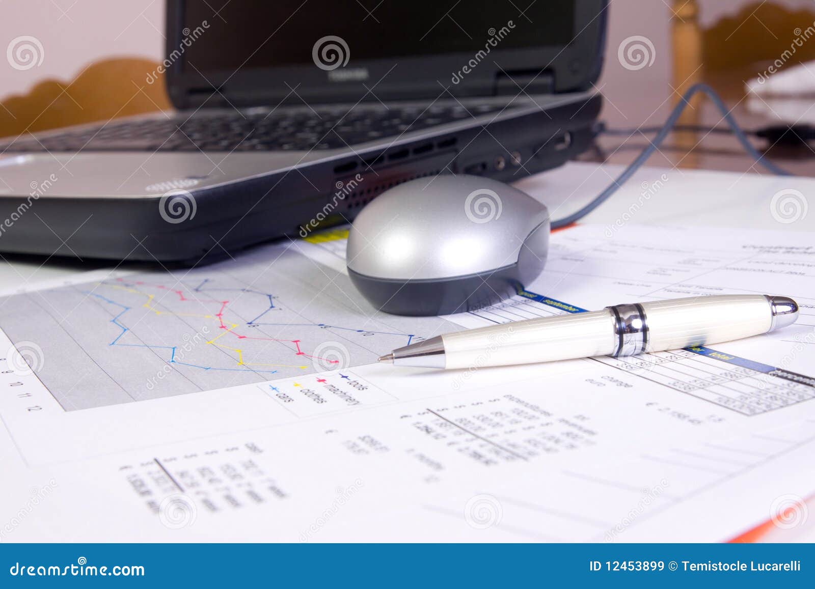 Laptop and reports stock image. Image of office, paper - 12453899