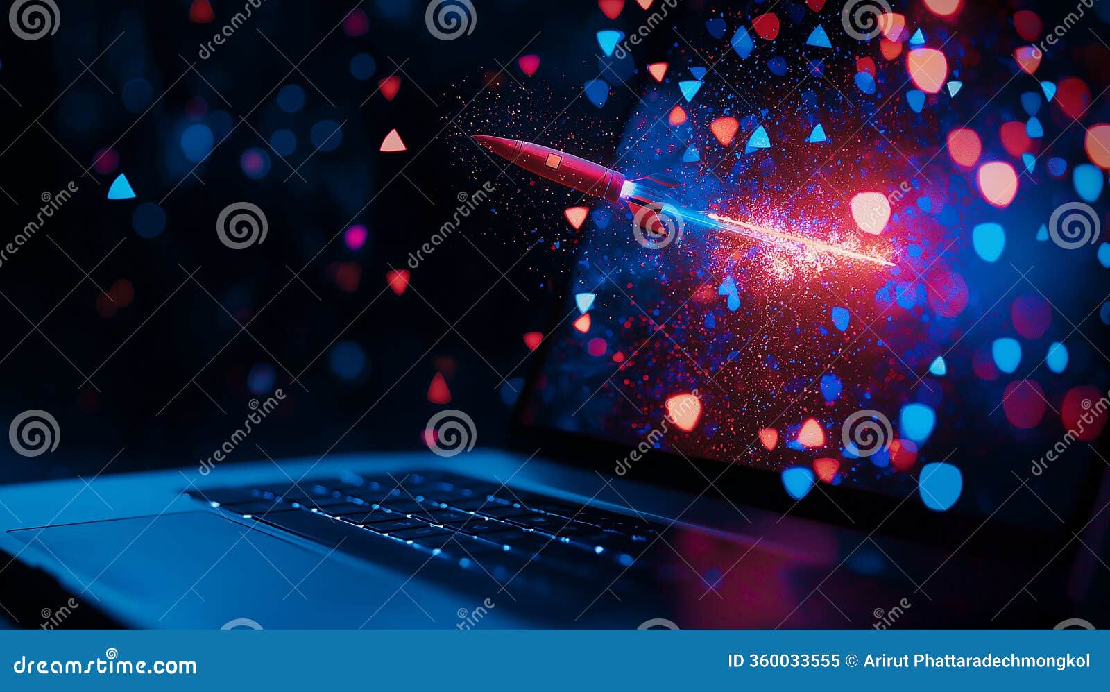 Laptop with Rocket Flying Out of Screen Surrounded by Colorful ...