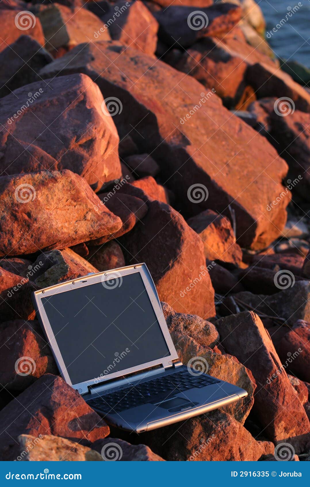 Laptop among rocks stock image. Image of business, rock - 2916335