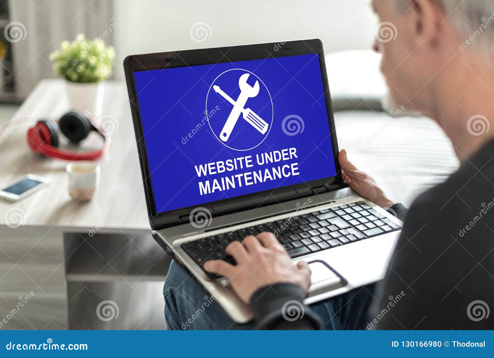 Website Maintenance Concept on a Laptop Screen Stock Photo - Image of ...