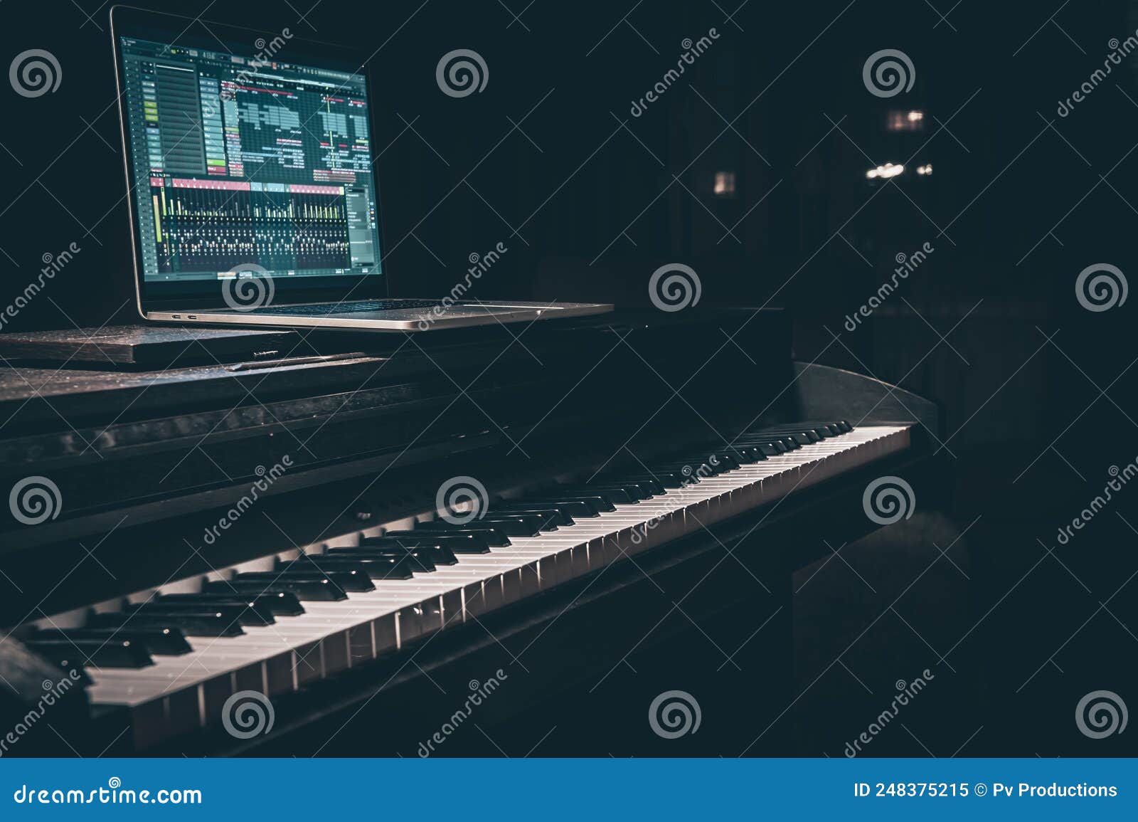 Laptop Screen Showing the Interface of a Music Program for Working with ...