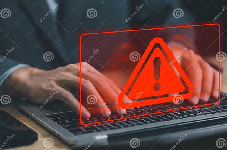 Laptop Shows a Warning Sign of System Failure and a Leak of Software ...
