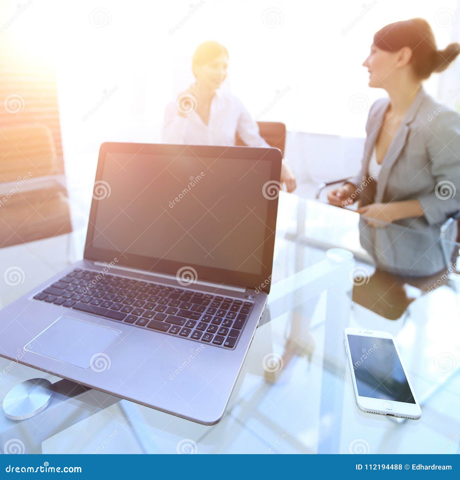 Laptop and a Smartphone on the Desktop of a Businessman Stock Photo ...