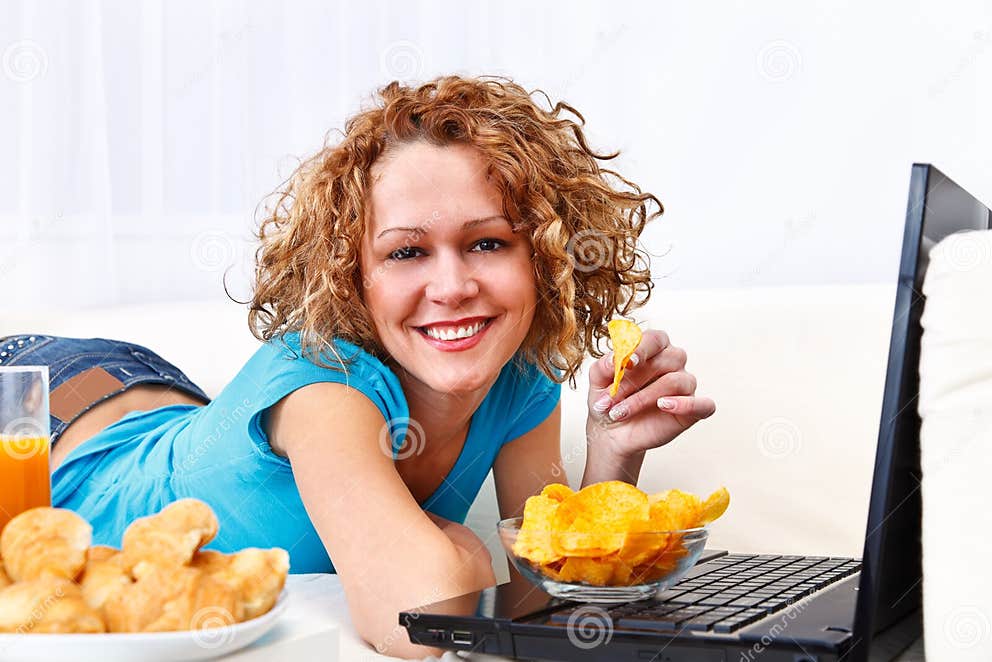 Laptop and snacks stock photo. Image of woman, pretty - 23970976