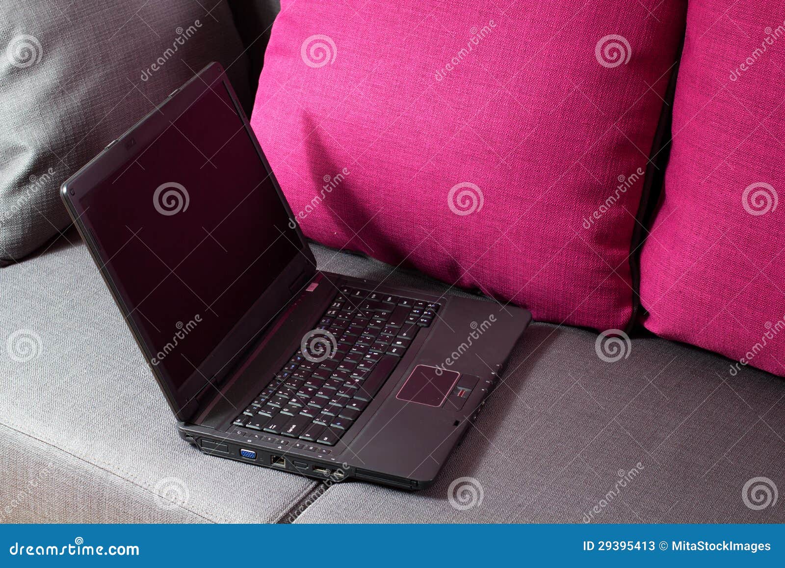 Laptop on sofa stock image. Image of laptop, keyboard - 29395413