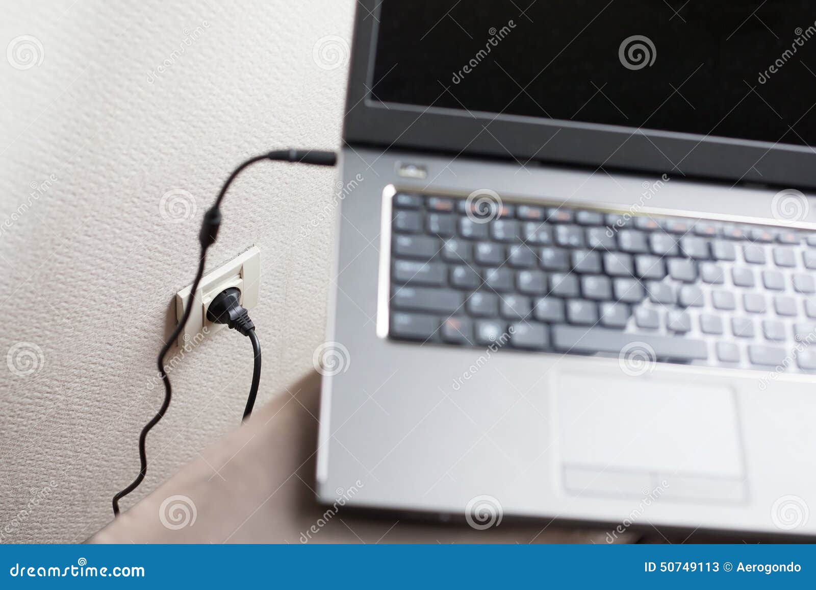 Laptop on sofa handrail stock image. Image of clean, black - 50749113