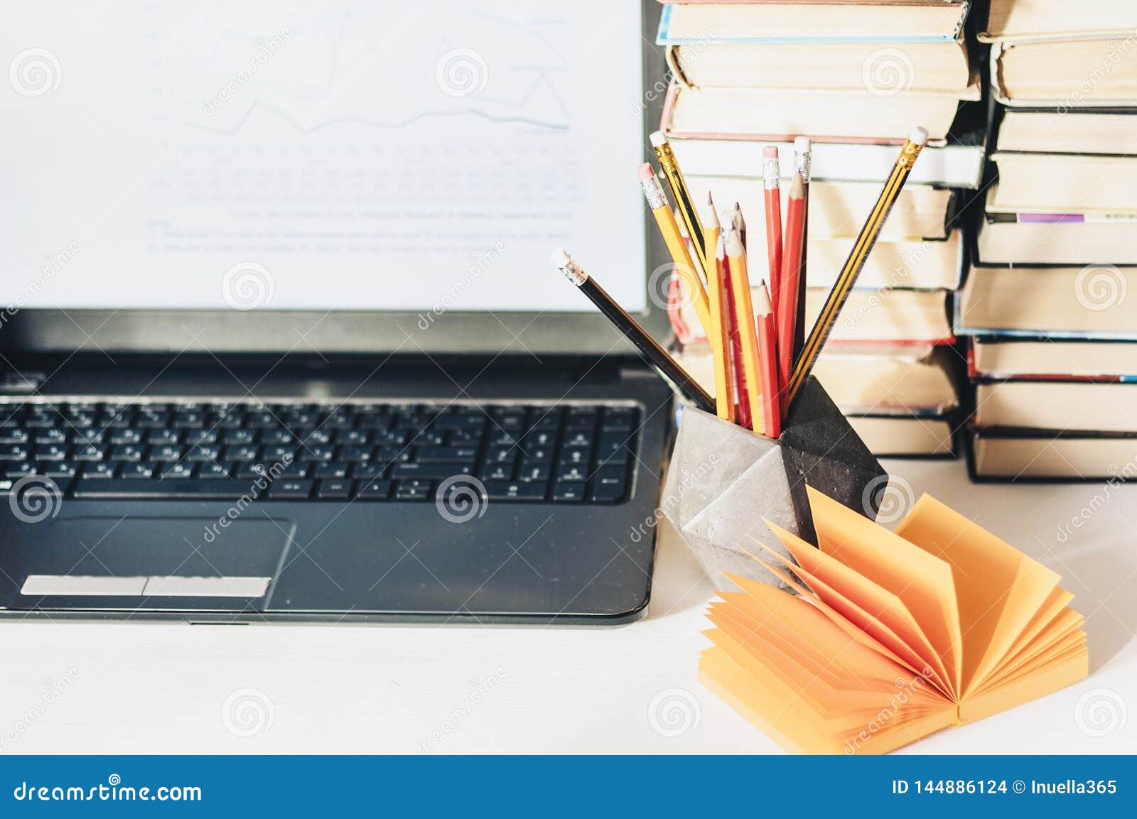 Laptop, Stack of Books, Notebook, Pencils in Office Background for ...
