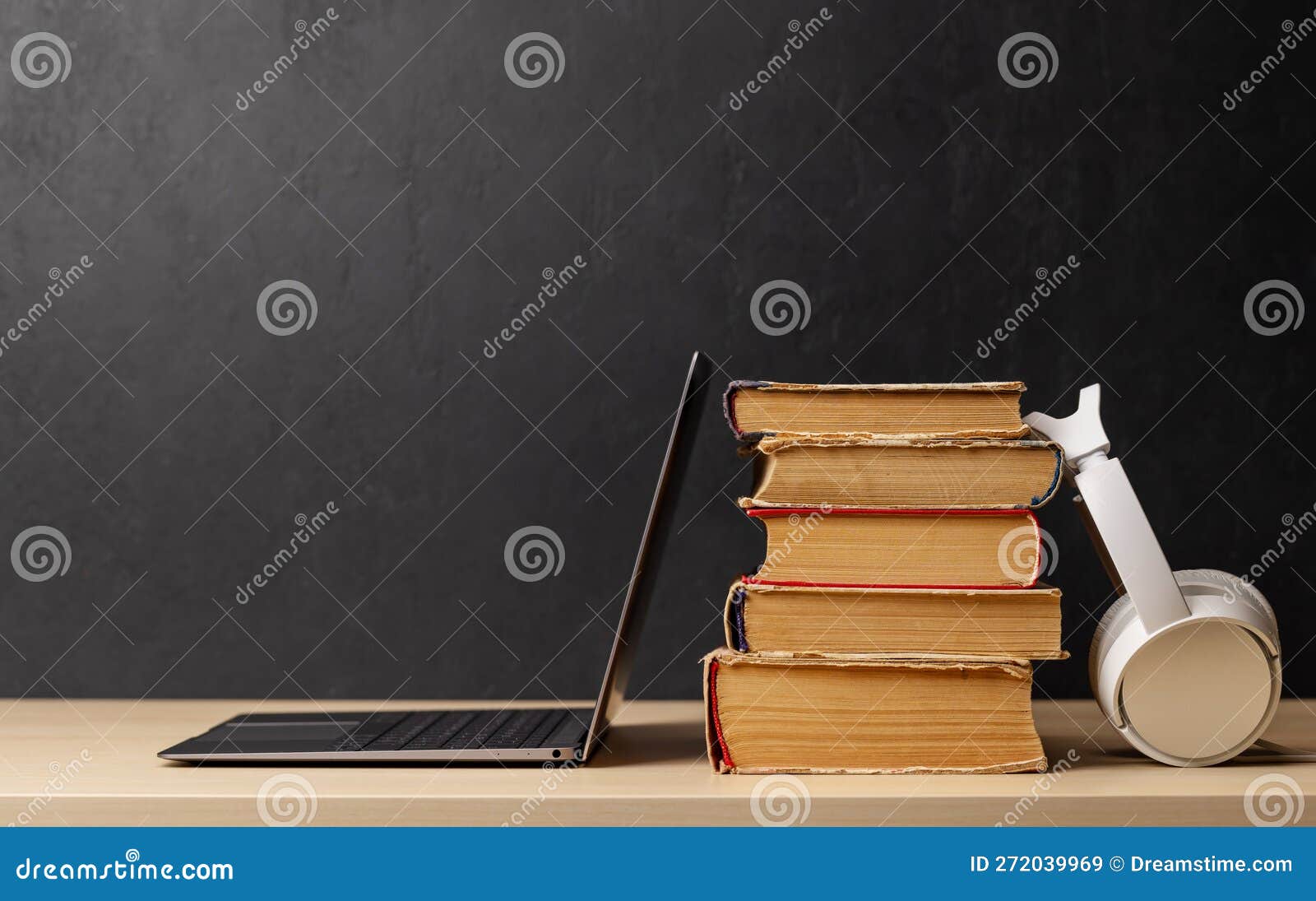 Laptop and stack of books stock image. Image of information - 272039969