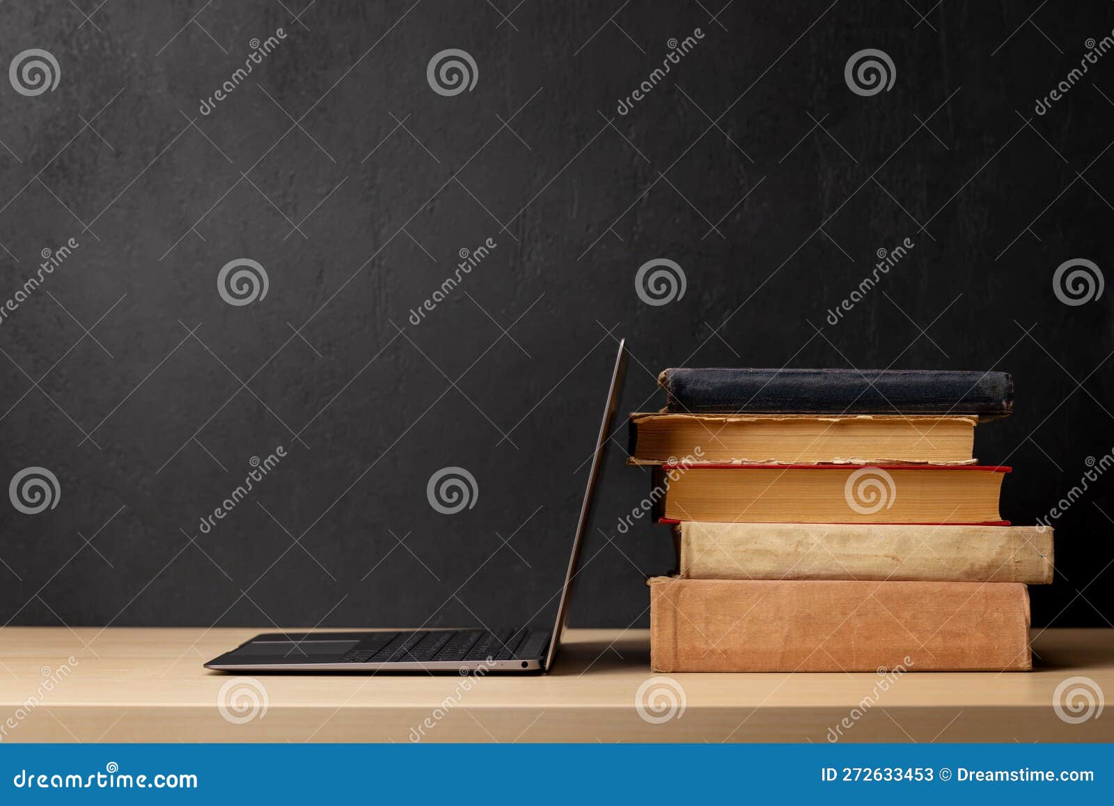 Laptop and stack of books stock image. Image of people - 272633453