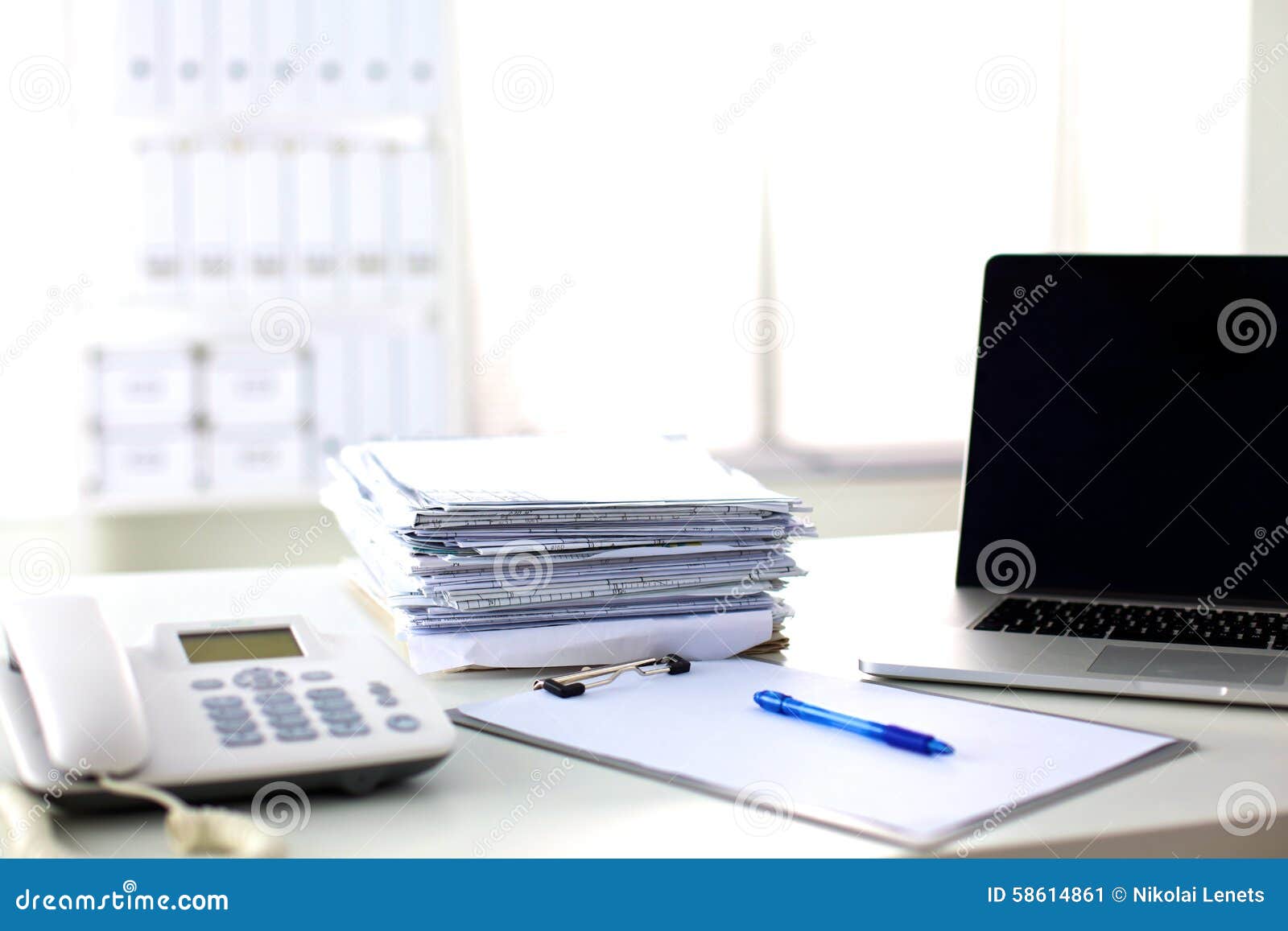 Laptop with Stack of Folders on Table on White Stock Image - Image of ...