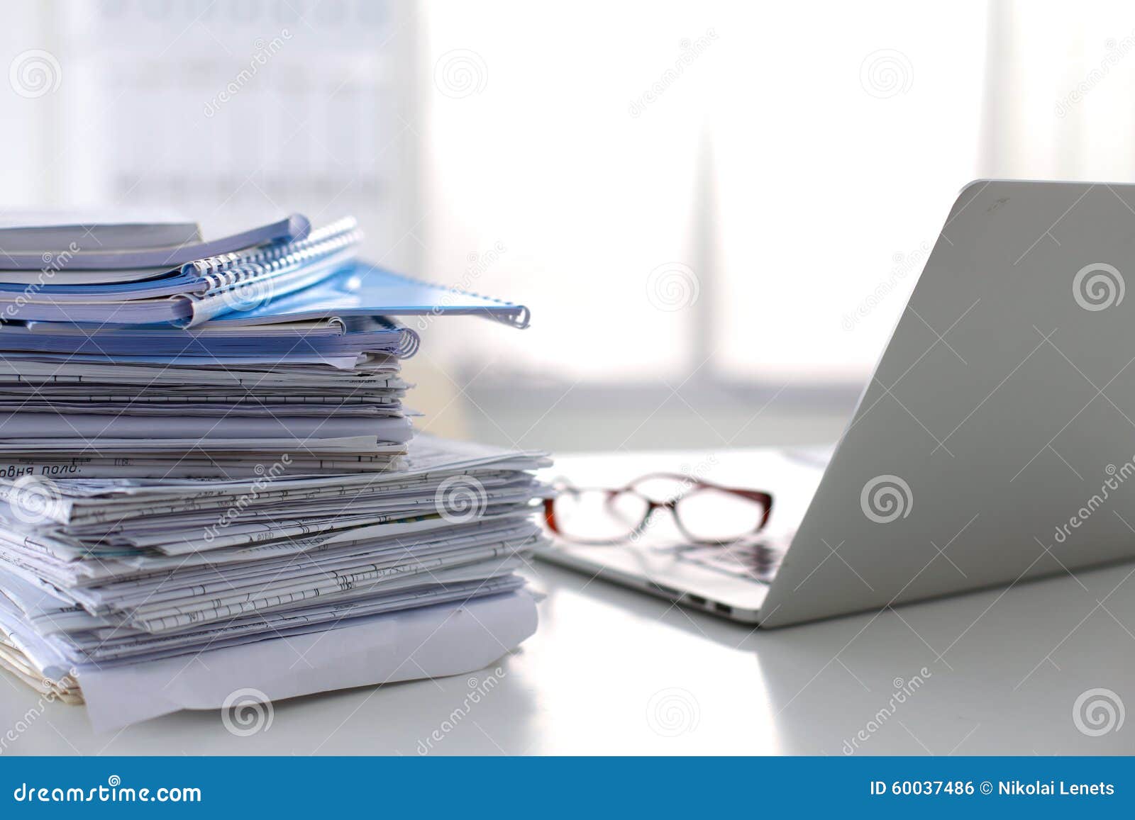 Laptop with Stack of Folders on Table on White Stock Photo - Image of ...