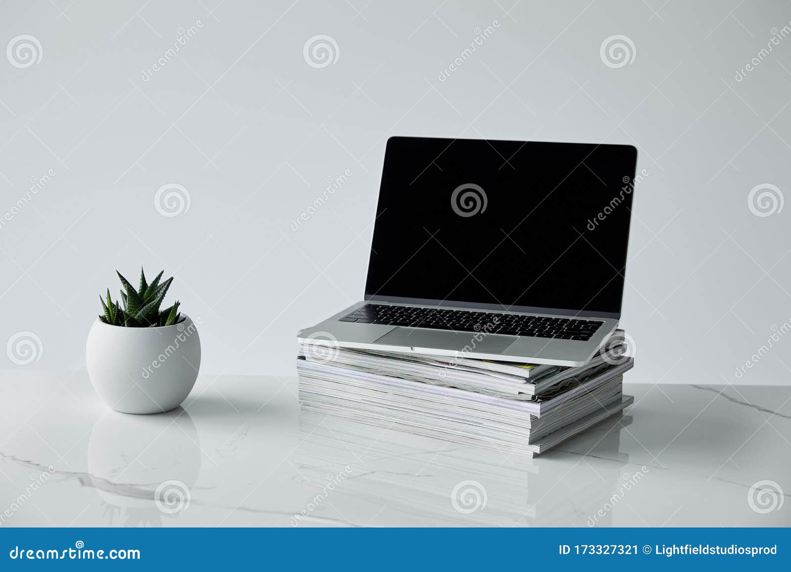 Laptop on Stack of Journals, and Stock Image - Image of marble, stacked ...