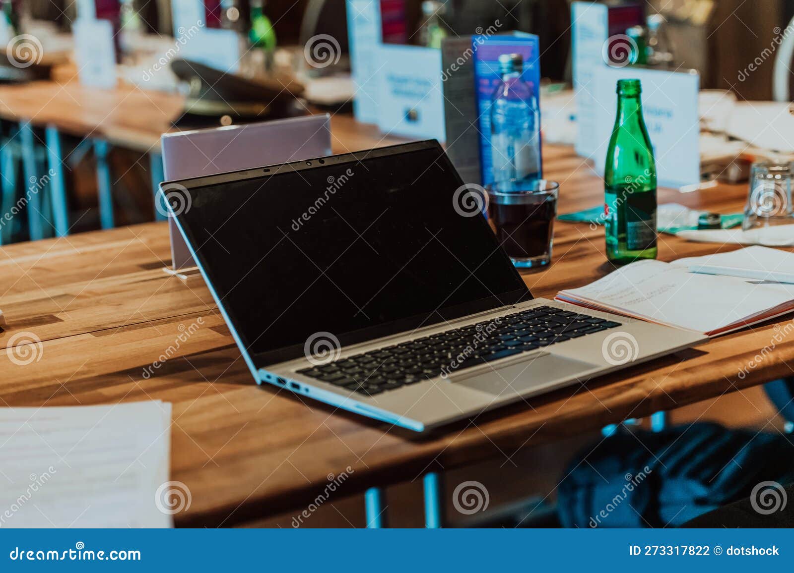 A Laptop on the Table of a Large Seminar Hall Stock Photo - Image of ...