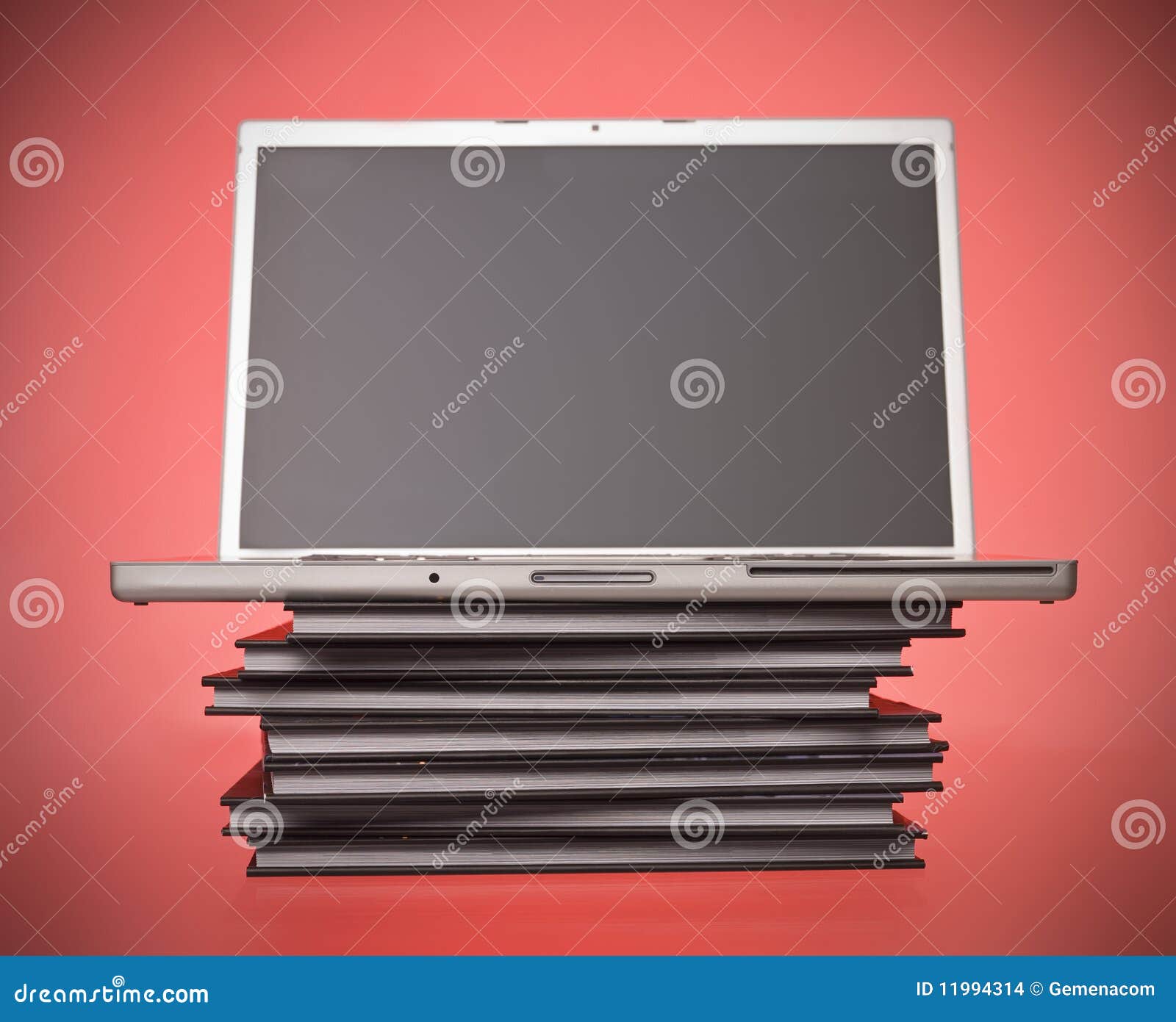 Laptop on top of books stock photo. Image of book, communications ...