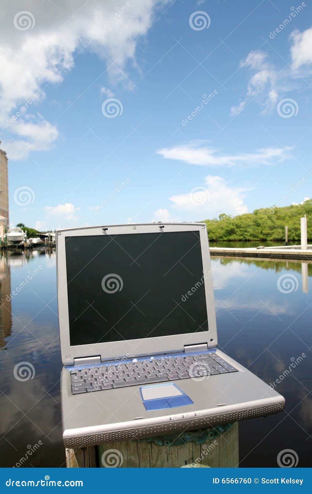 Laptop on the water stock photo. Image of tropics, condo - 6566760