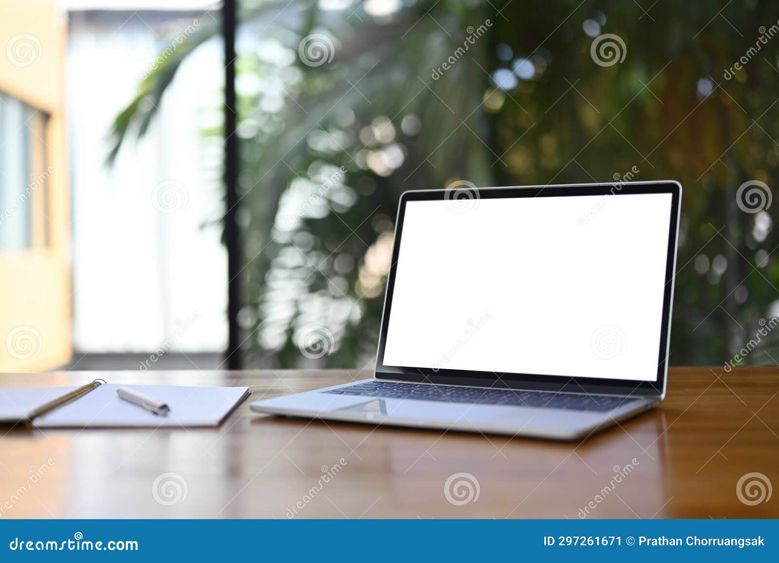 Laptop with with White Empty Display and Notepad on Wooden Table Near ...