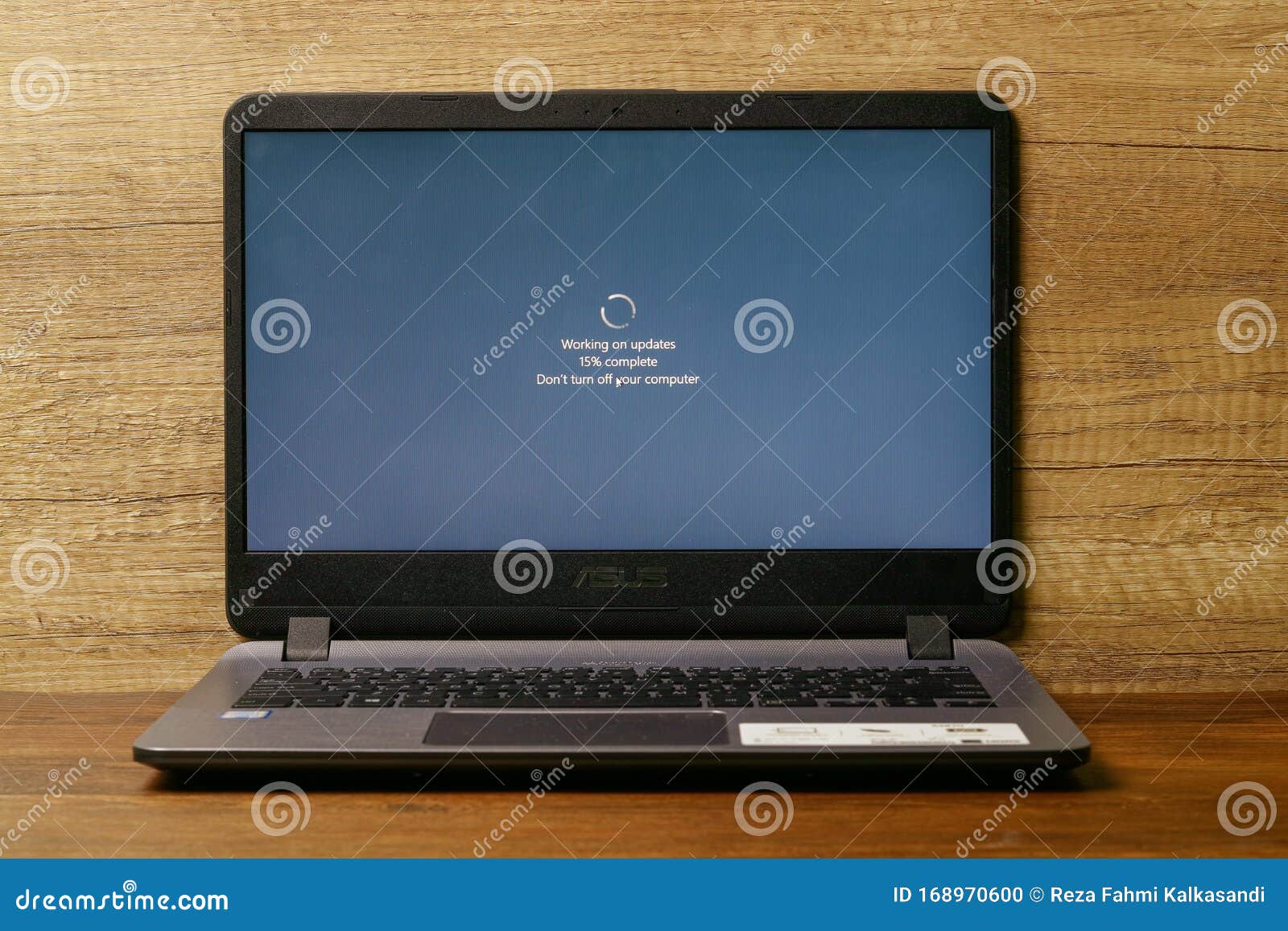 The Laptop with Windows Update on Screen. Its Offers Increased Security ...