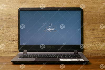 The Laptop with Windows Update on Screen. Its Offers Increased Security ...