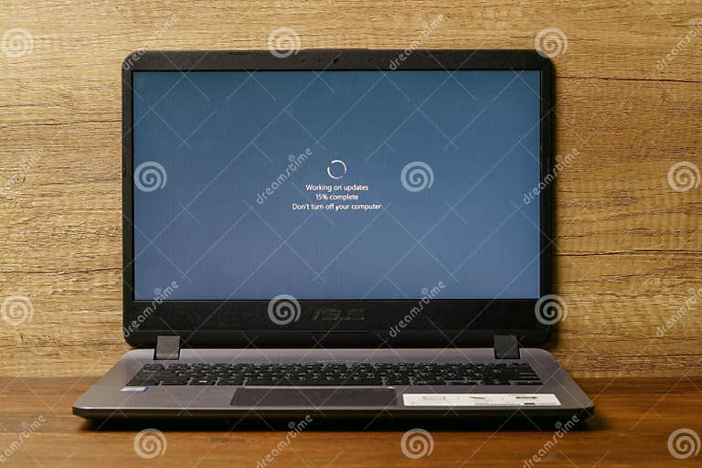The Laptop with Windows Update on Screen. Its Offers Increased Security ...